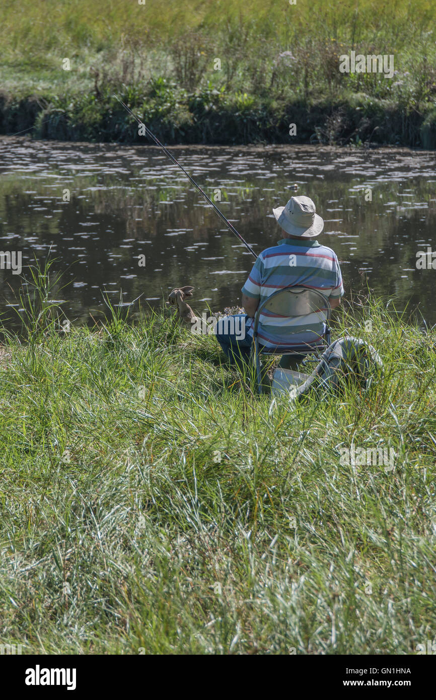 Seated fisherman hi-res stock photography and images - Alamy