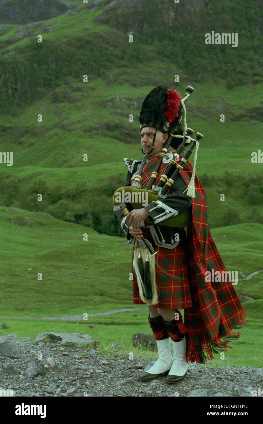 scottish piper in great glen highlands brian mcguire Stock Photo - Alamy