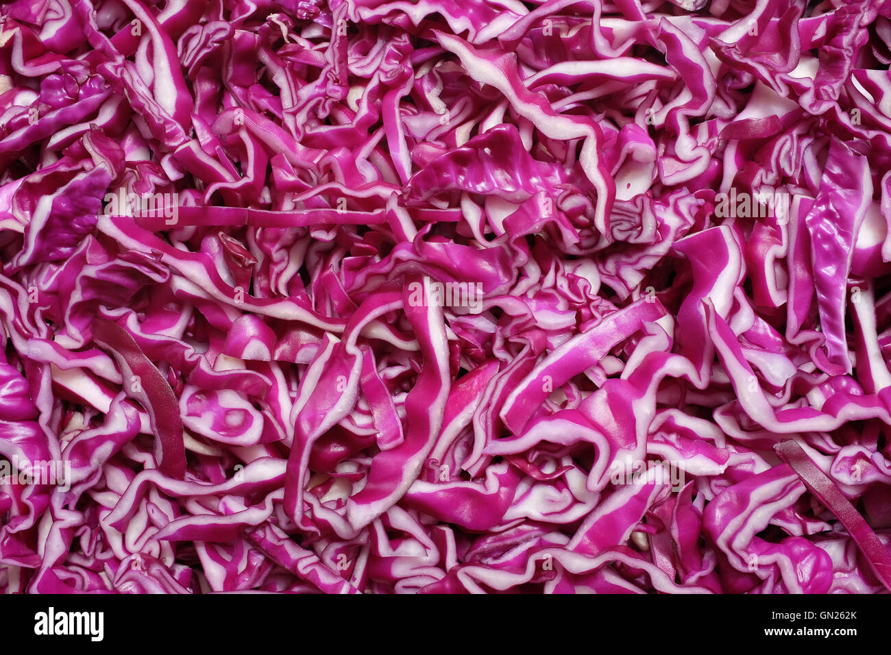 Shredded raw red cabbage as an abstract background texture Stock Photo ...