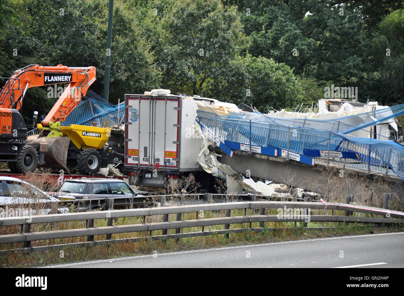 Kent, UK 27th Aug, 2016 A pedestrian bridge has collapsed on a motorway ...