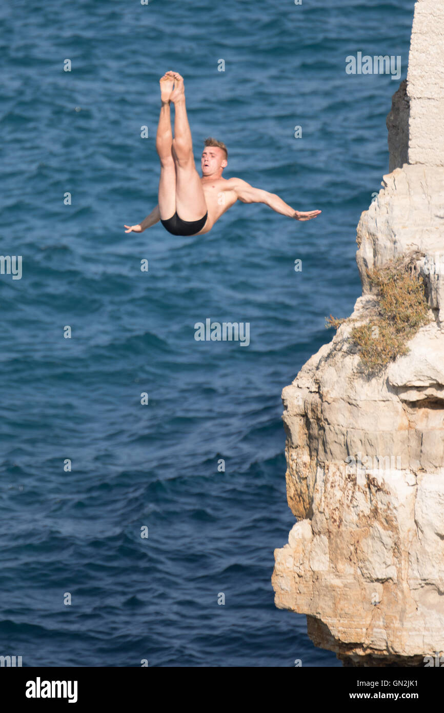 Polignano a Mare, Italy. 27th August, 2016. Artem Silchenko from Russia performs a training dive ...