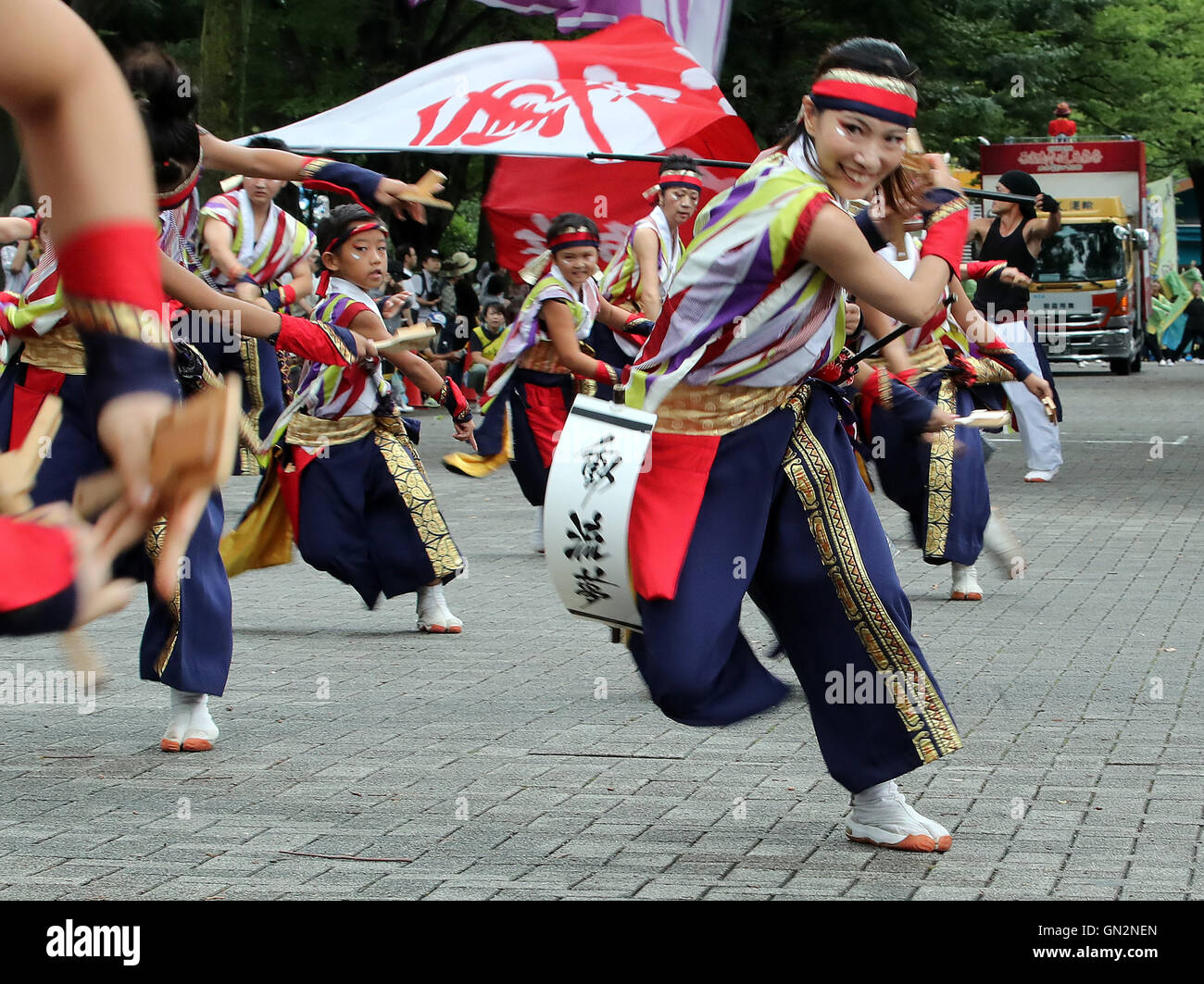 Tokyo, Japan. 27th Aug, 2016. Dancers using flags perform in the ...