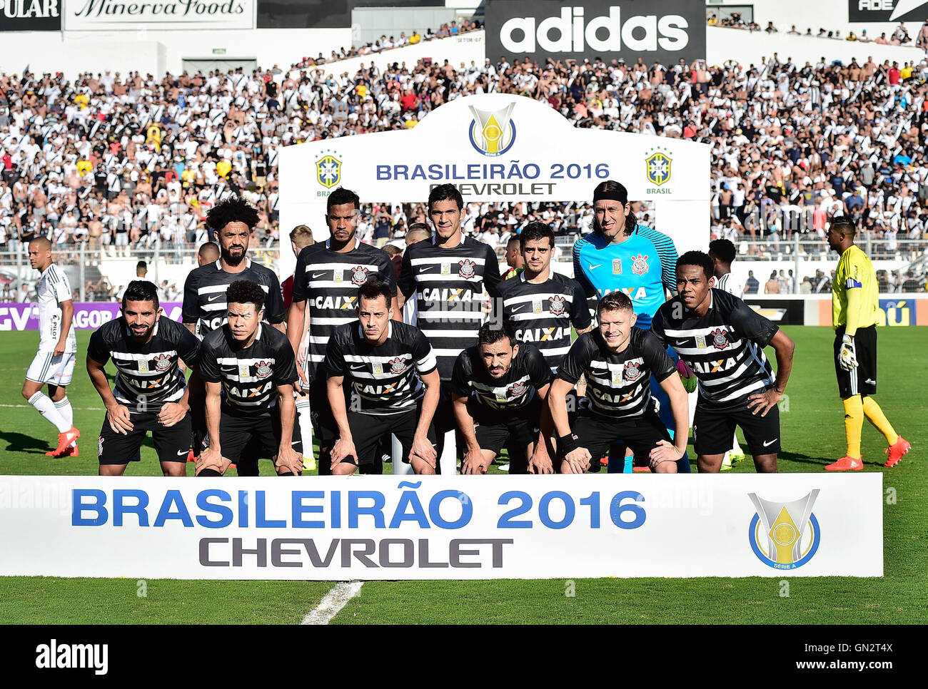 Team posed hi-res stock photography and images - Alamy