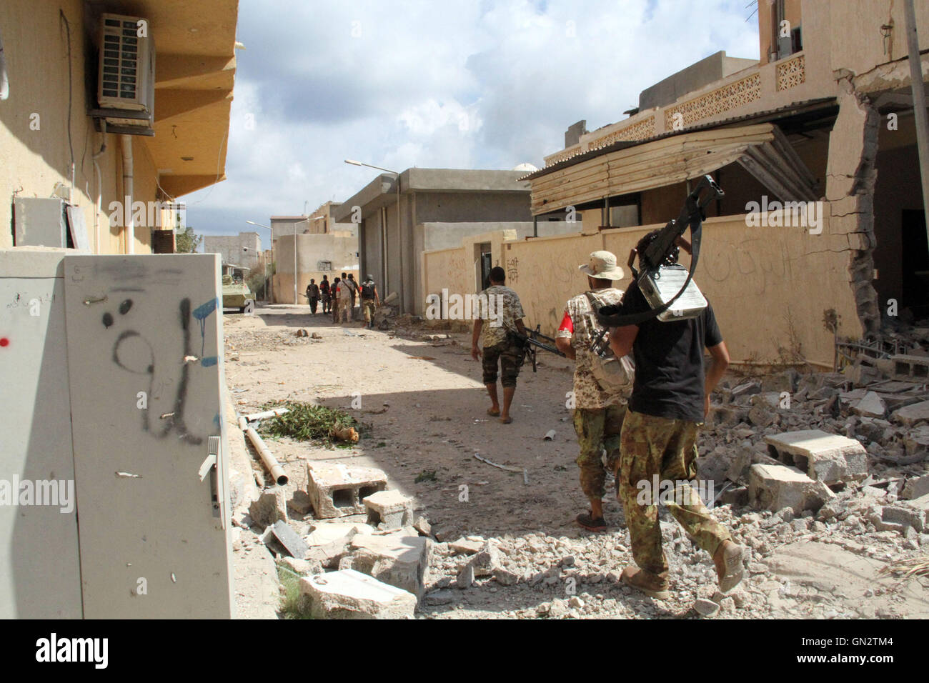 Sirte, Libya. 28th Aug, 2016. Members of the forces loyal to Libya's UN ...