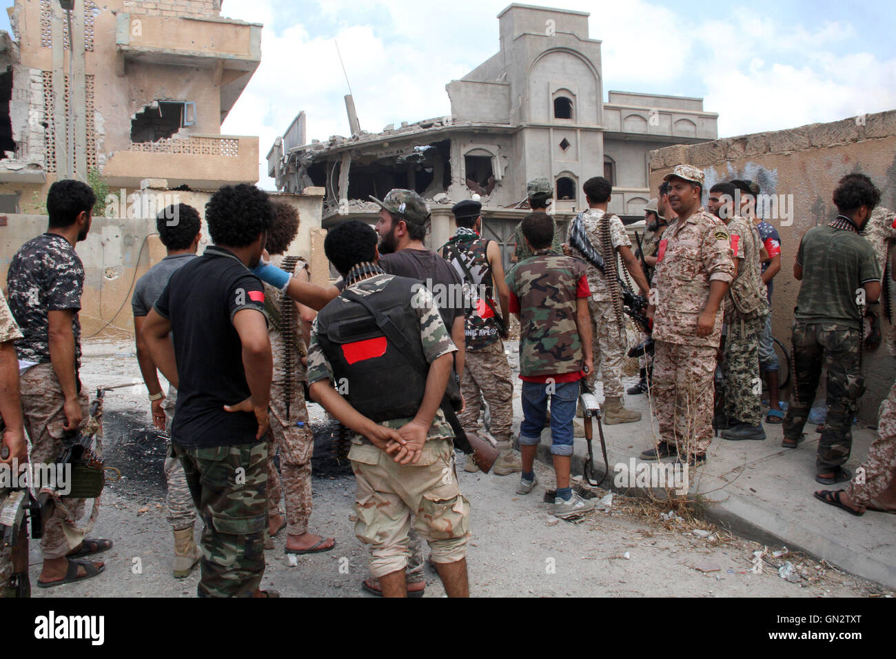 Sirte, Libya. 28th Aug, 2016. Members of the forces loyal to Libya's UN ...