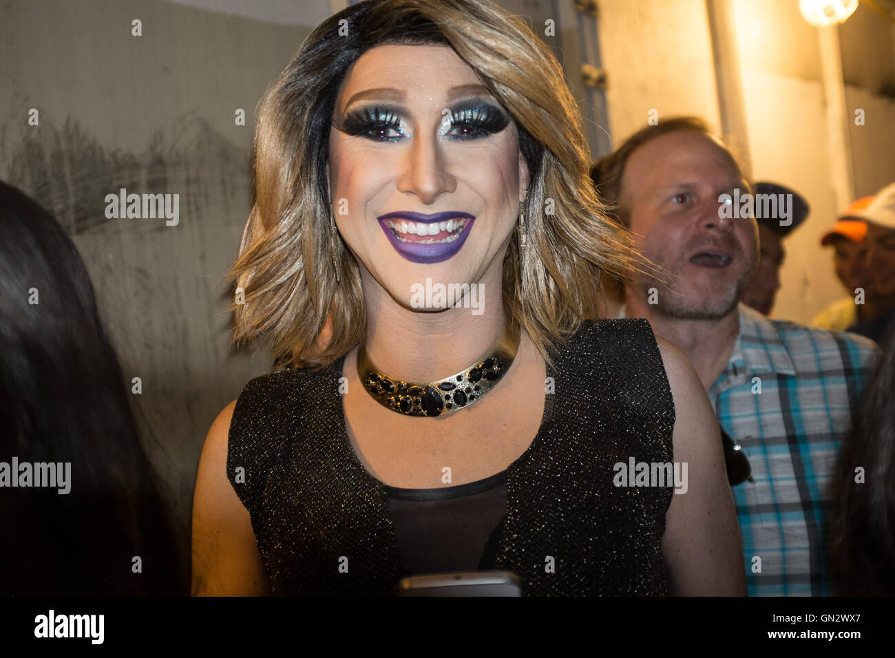August 27, 2016 - A drag queen smiles and poses for a photo during the ...