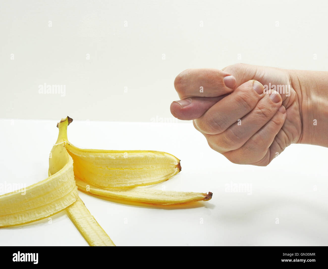 Man's arm showing fig Stock Photo - Alamy