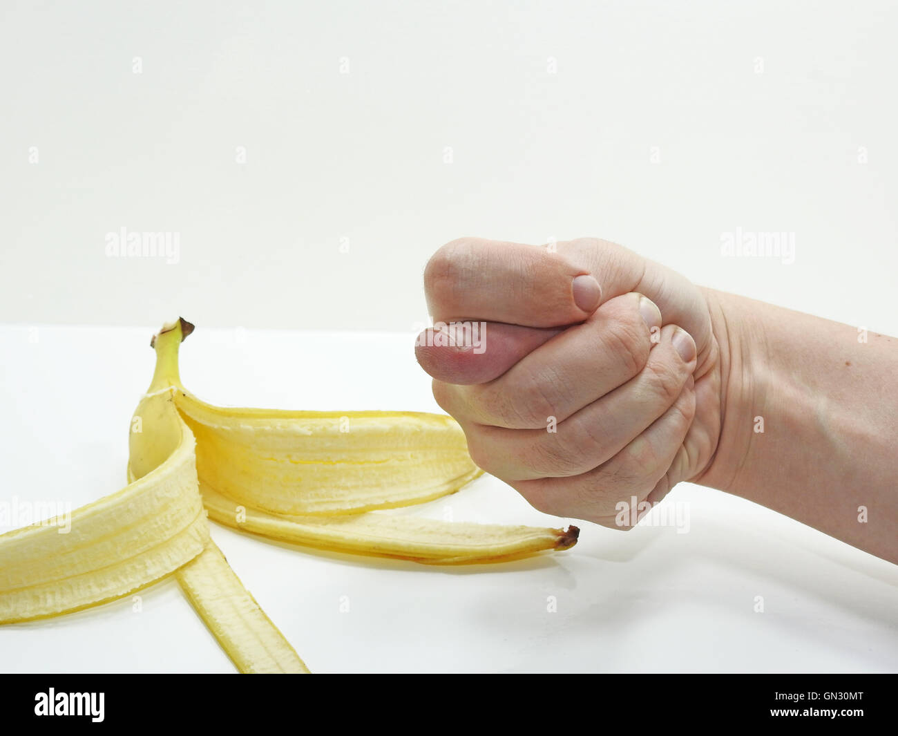 Man's arm showing fig Stock Photo - Alamy