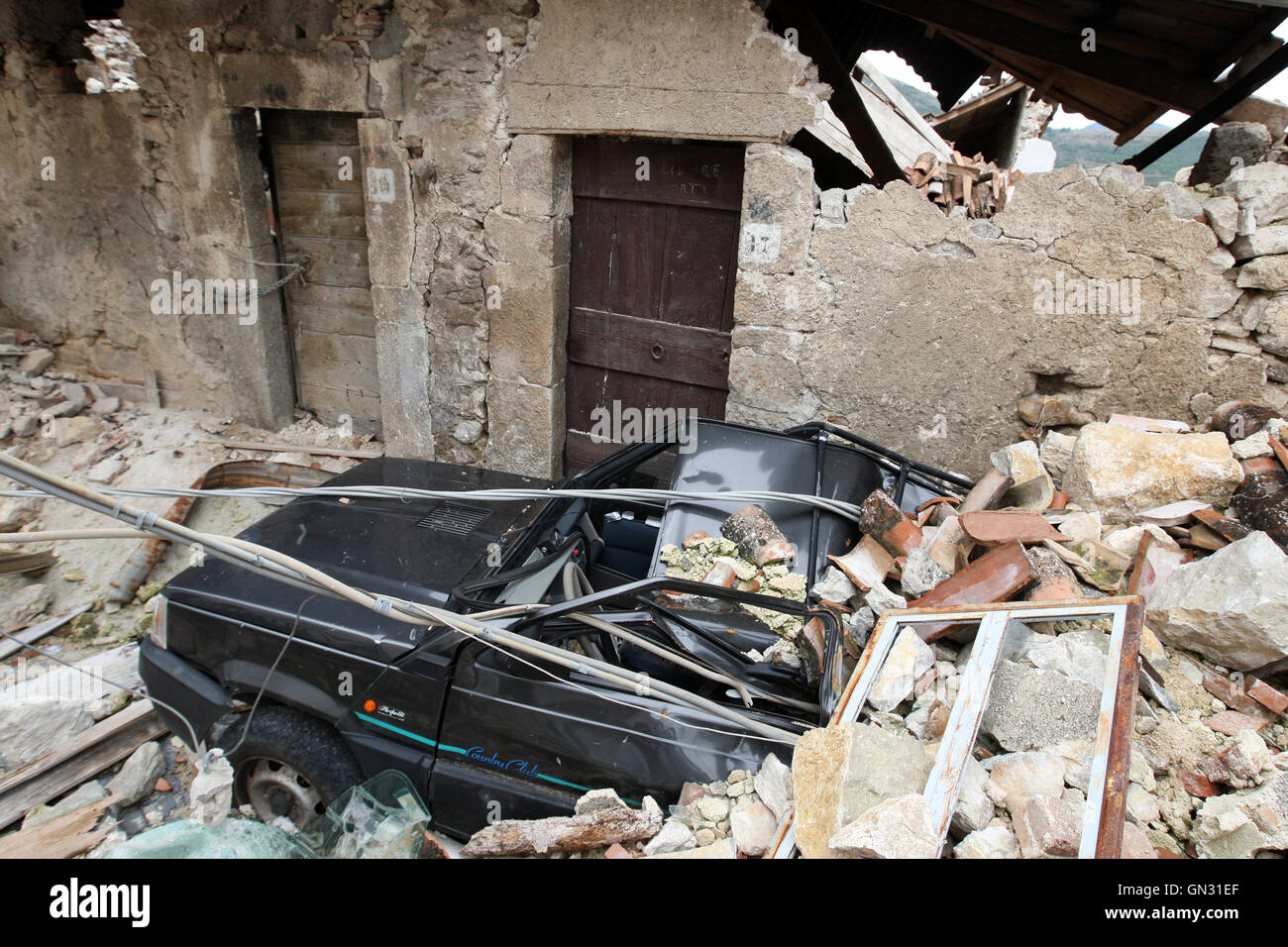 Car buried in rubble hi-res stock photography and images - Alamy