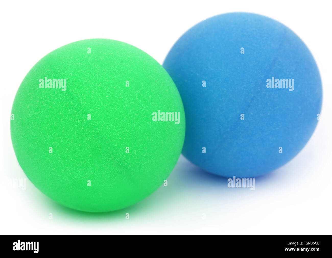 Table tennis balls over white background Stock Photo - Alamy