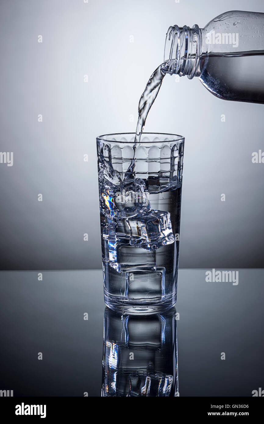 Pouring refreshing water Stock Photo - Alamy