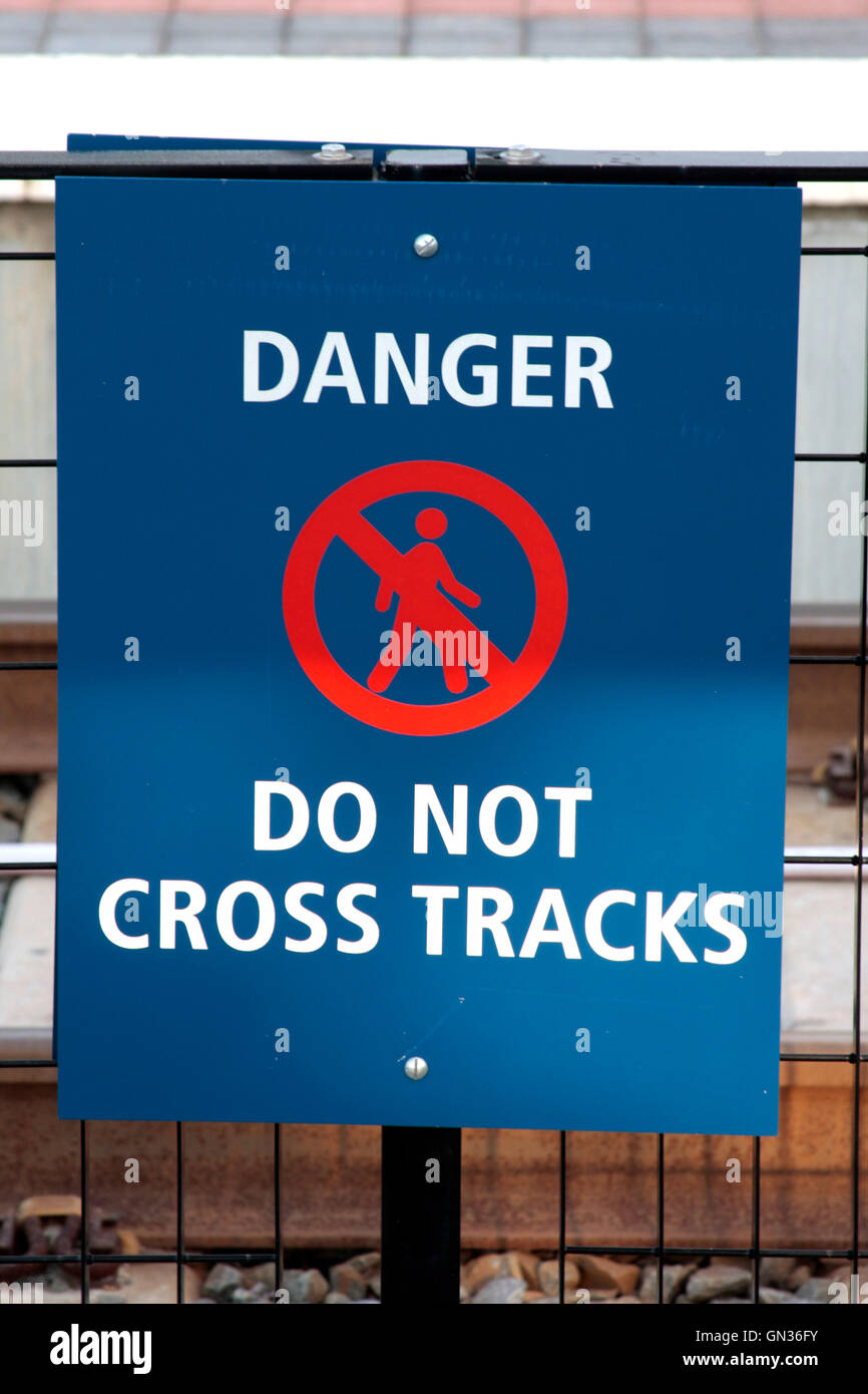 Danger Do Not Cross Tracks sign Stock Photo - Alamy
