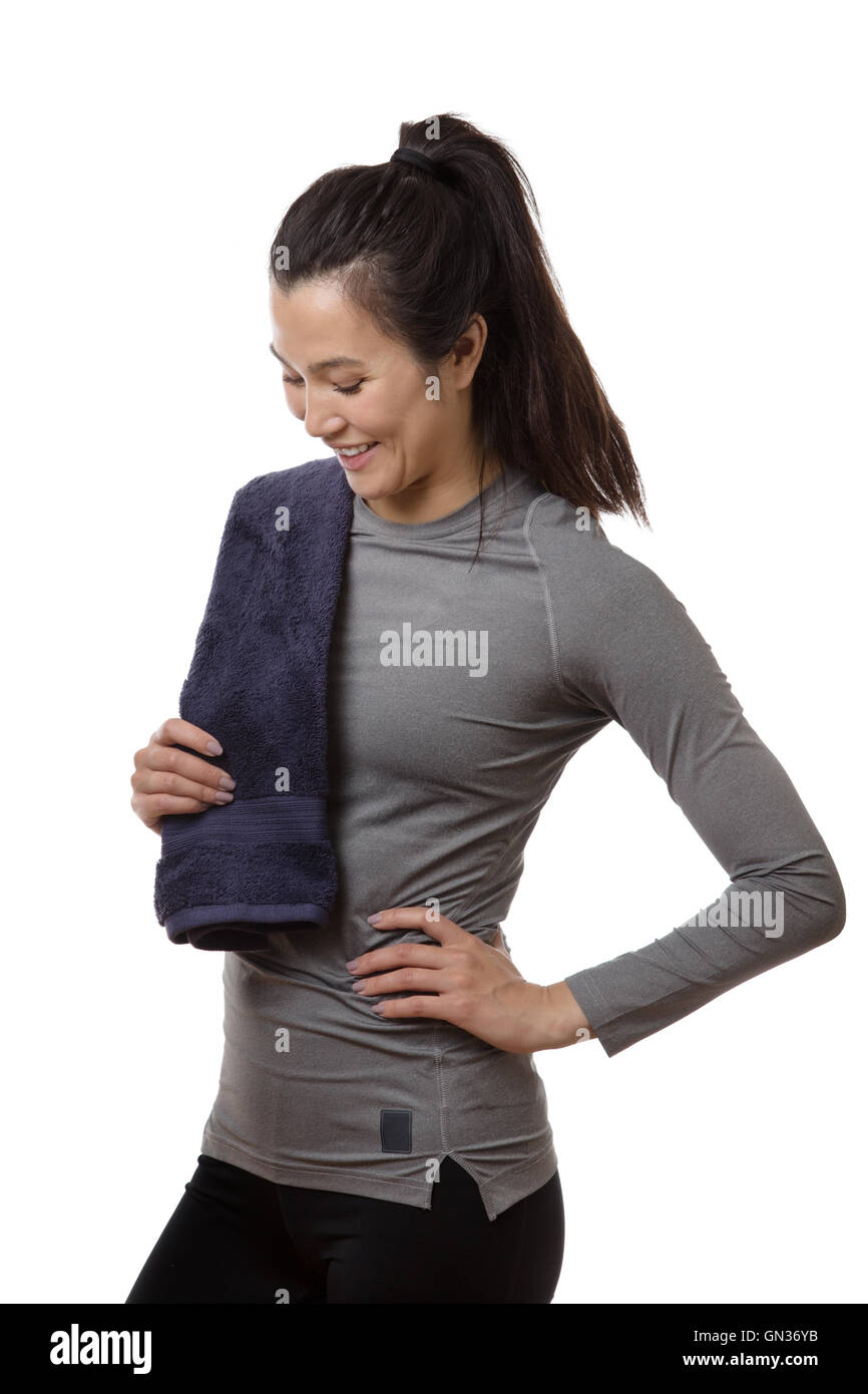female with a towel over her shoulder Stock Photo - Alamy