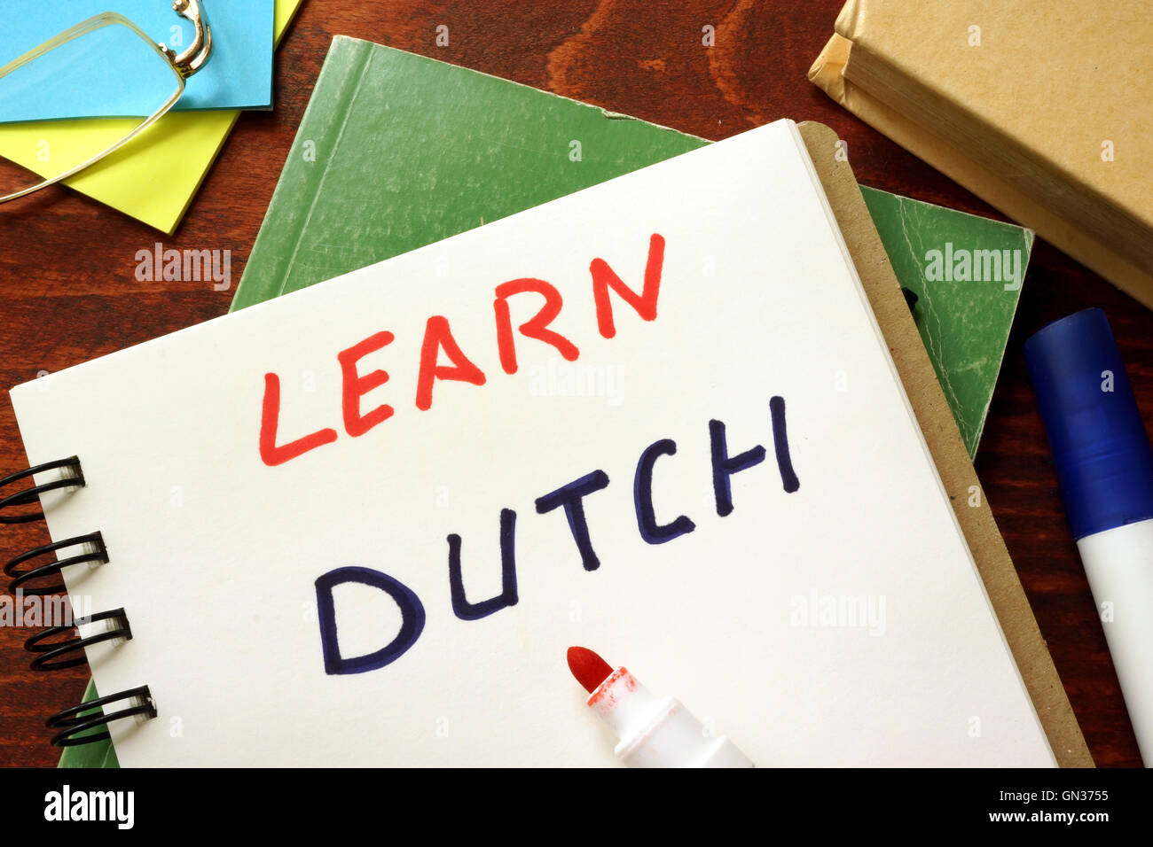 Learn dutch written in a notepad. Education concept Stock Photo - Alamy