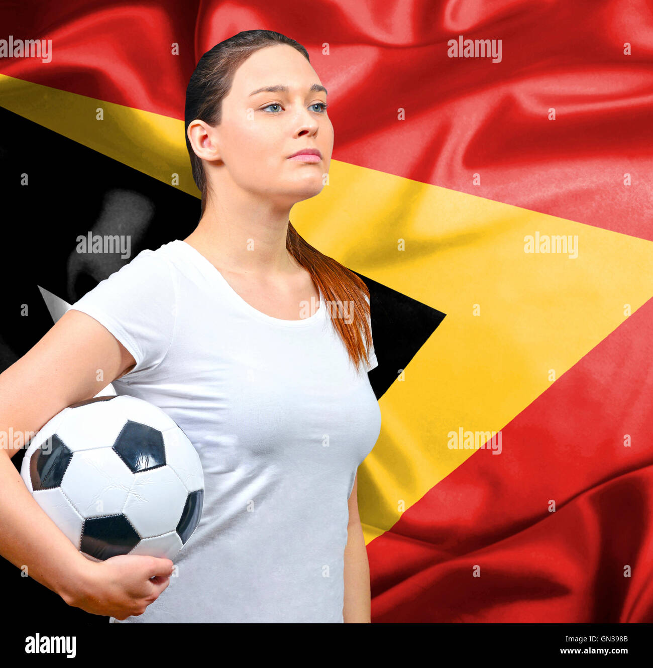 Proud woman football fan of East Timor Stock Photo - Alamy