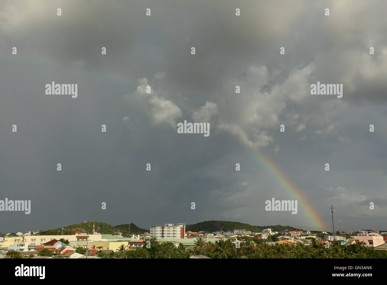 Rainbow sky after rain cloud gray Stock Photo - Alamy