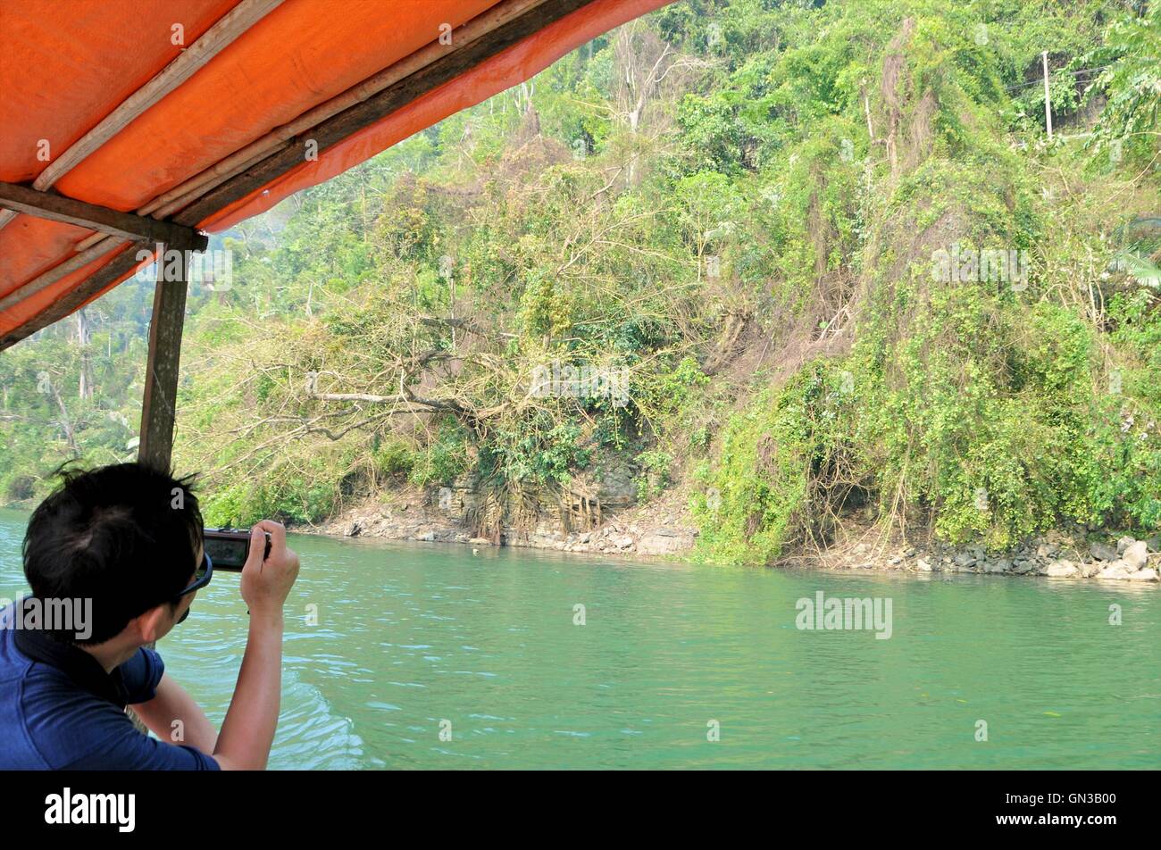 Ba Be Lake, Vietnam - 19 April 2011. Exploring the lush surrounds of Ba ...