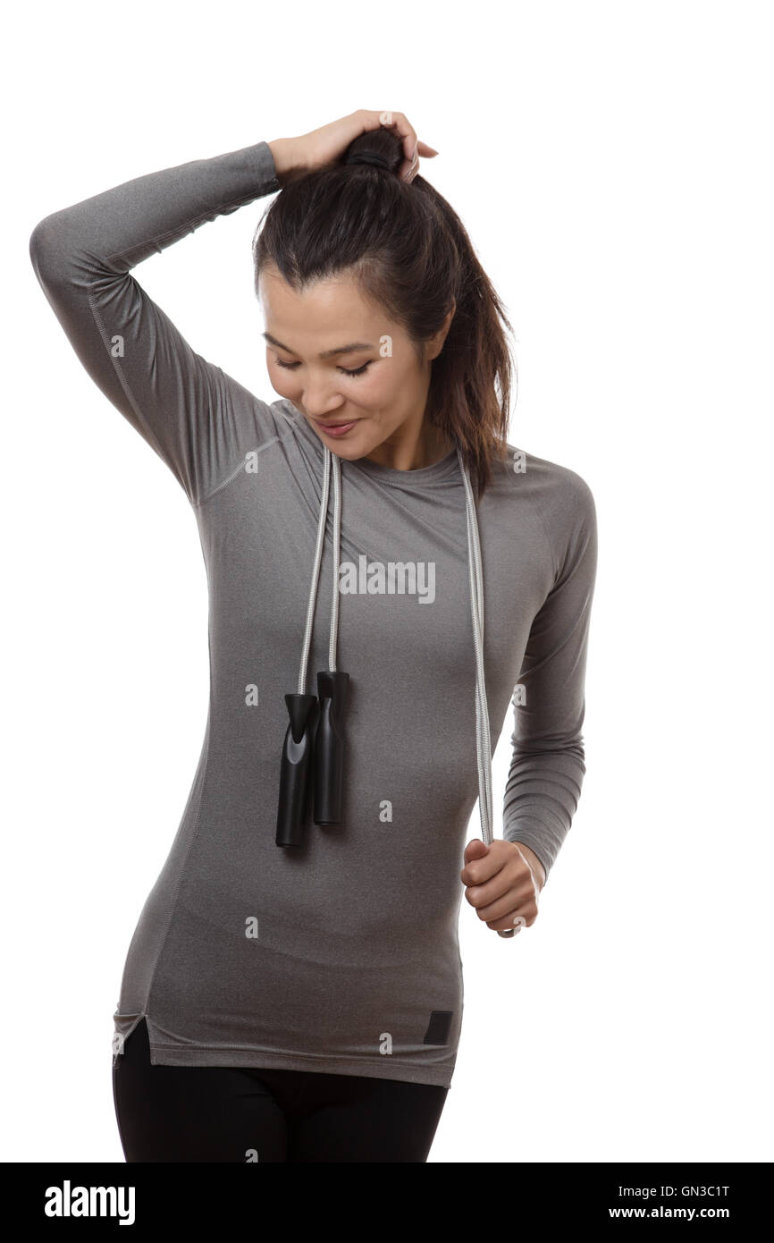 female with a skipping rope around her neck Stock Photo - Alamy