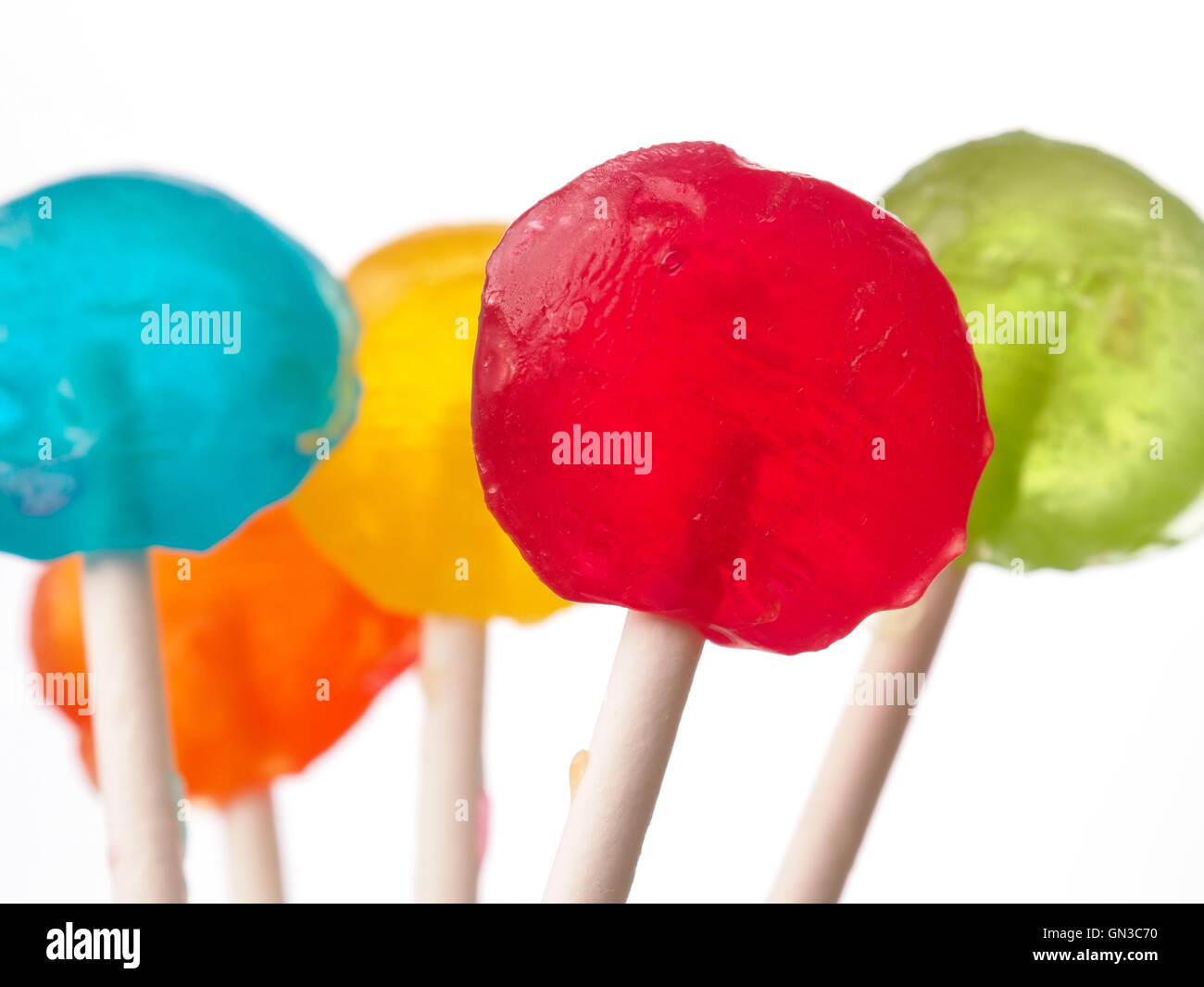 Colorful sweet lollies on a white background, selective focus on ...