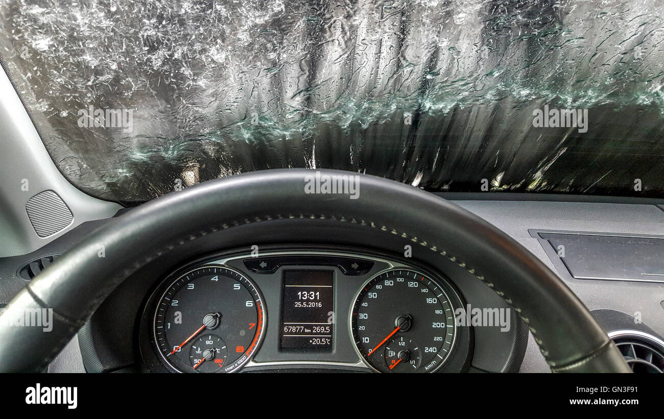 Car wash experience with a view from inside a vehicle during cleaning ...