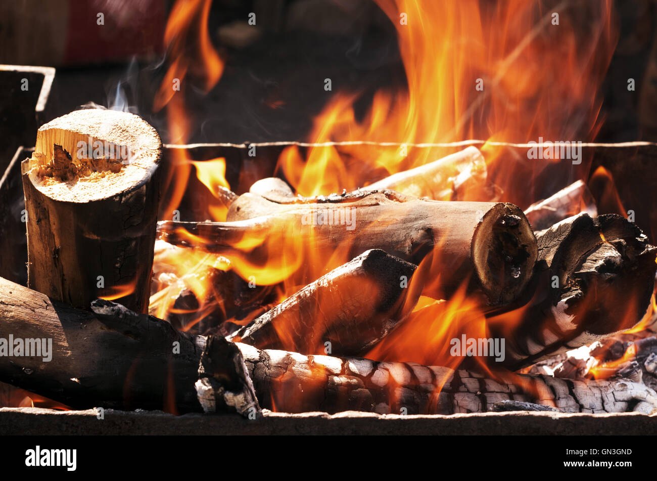 Firewood is burning in the char grill. Closeup of burning wood Stock ...