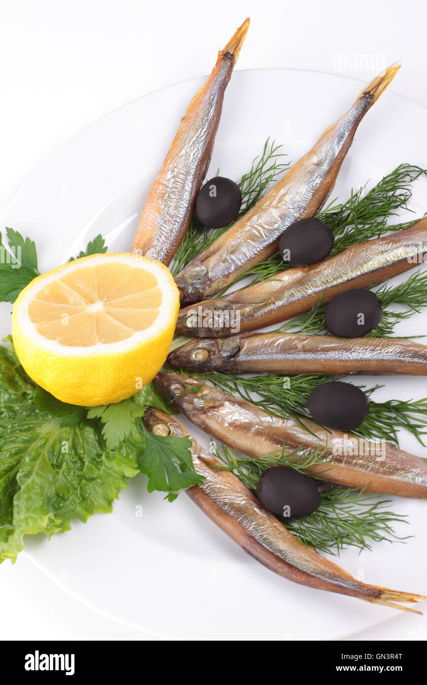 kipper fish on composition with vegetables Stock Photo - Alamy