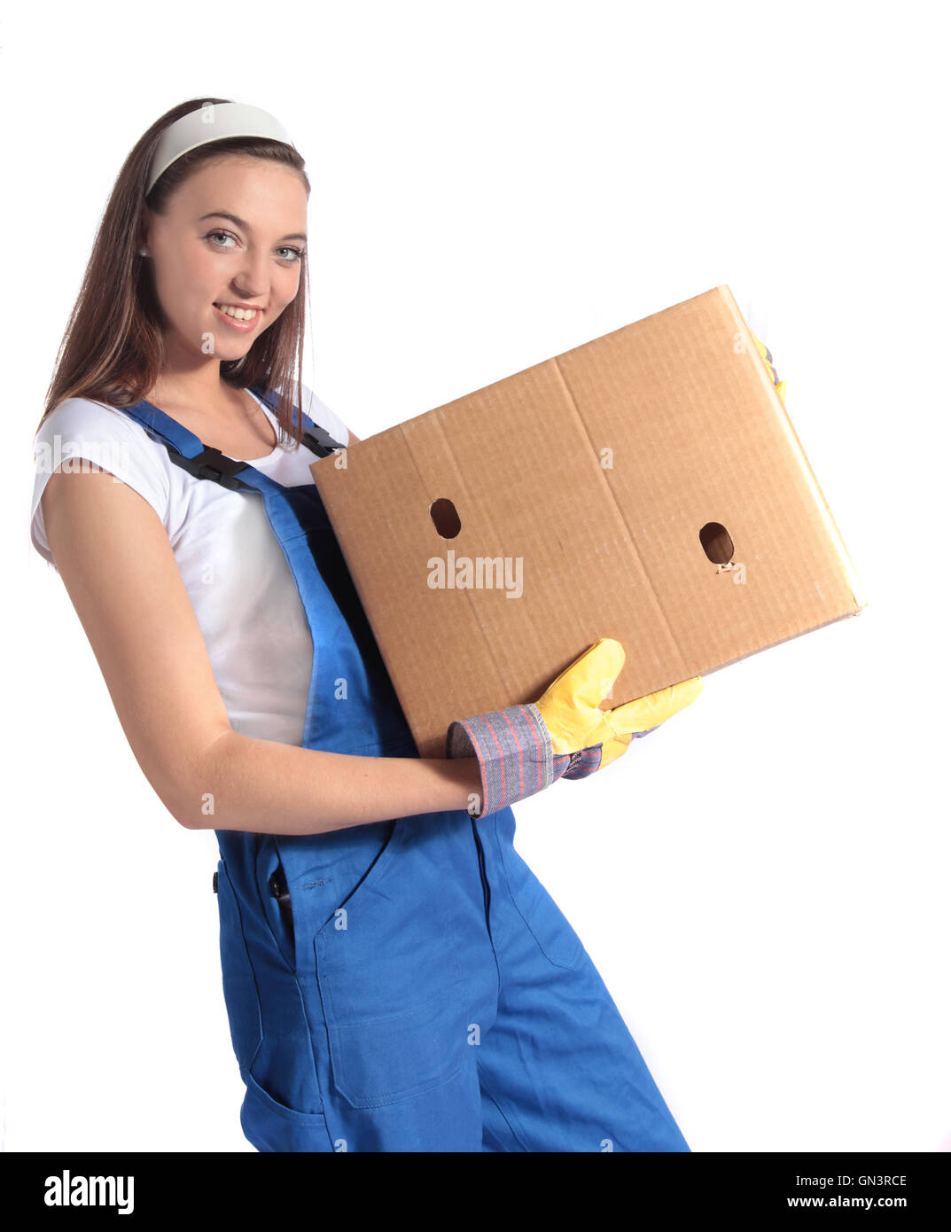 Young woman carrying moving box Stock Photo - Alamy