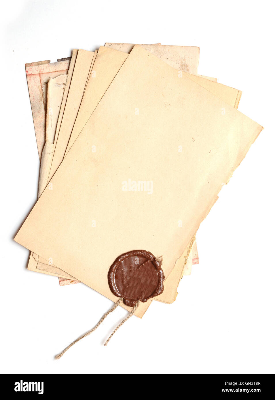 pile old paper with a wax seal on a white background Stock Photo - Alamy