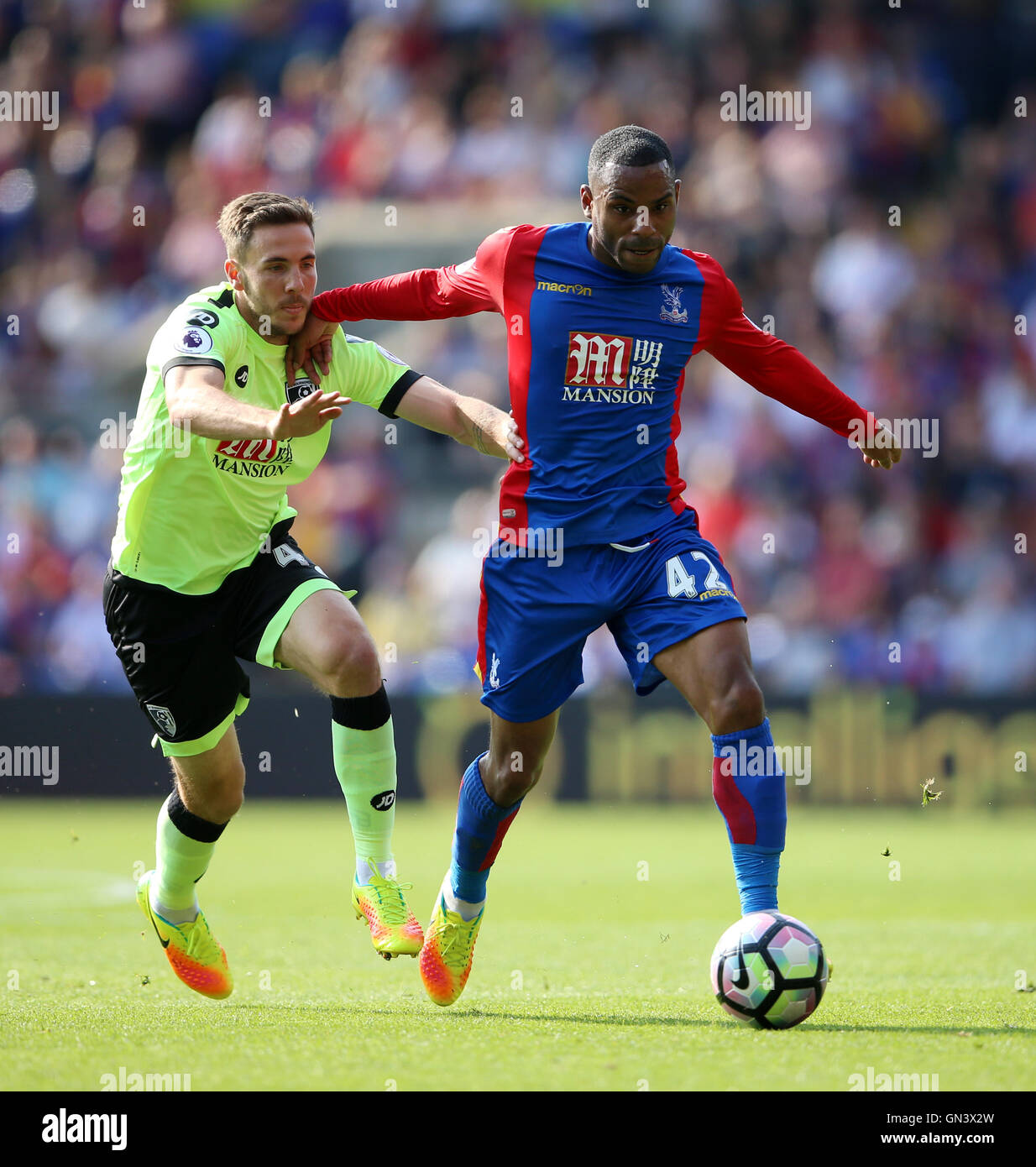 Crystal Palace's Jason Puncheon (right) and AFC Bournemouth's Andrew ...