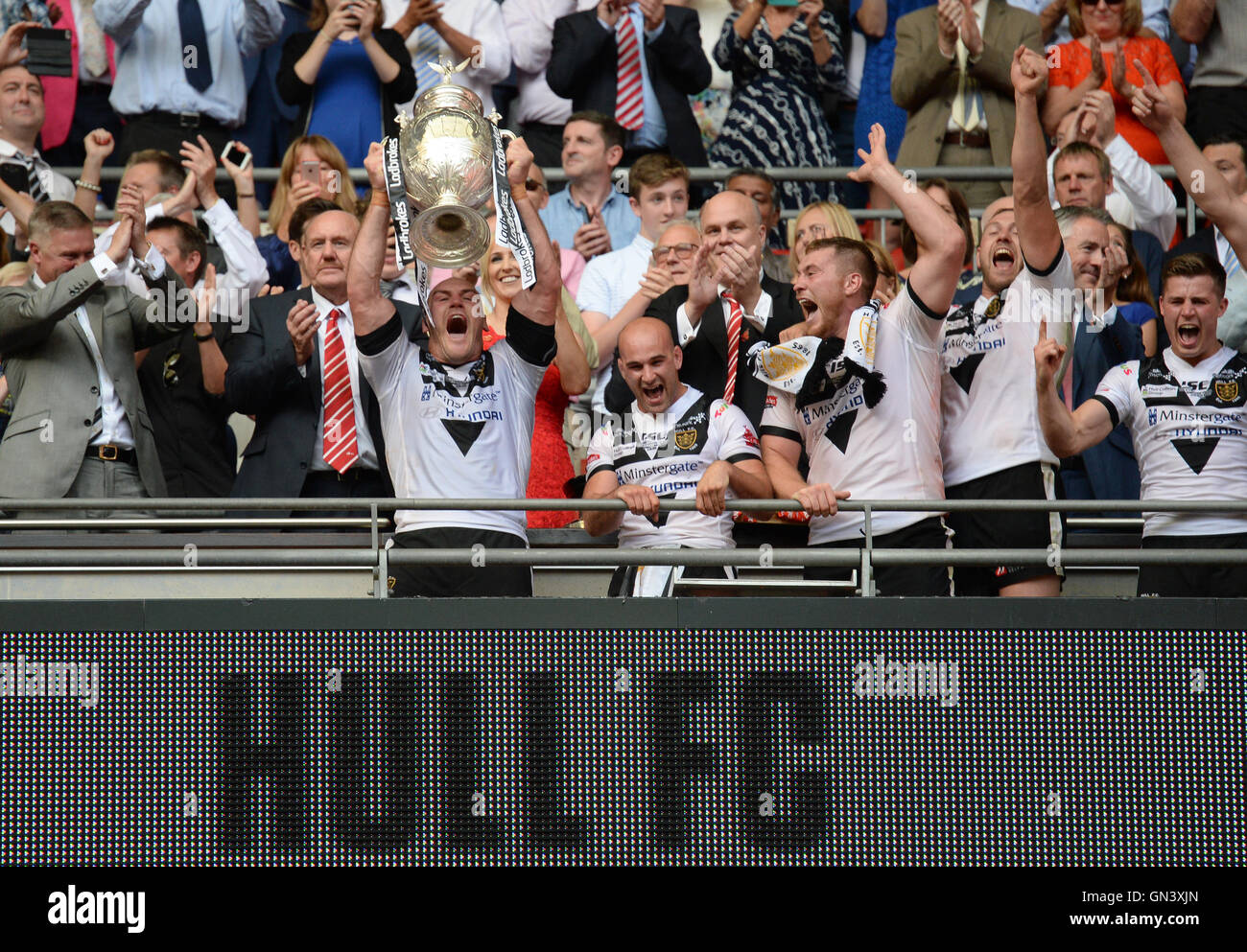 Hull FC's Gareth Ellis lifts the trophy as they celebrate winning the ...