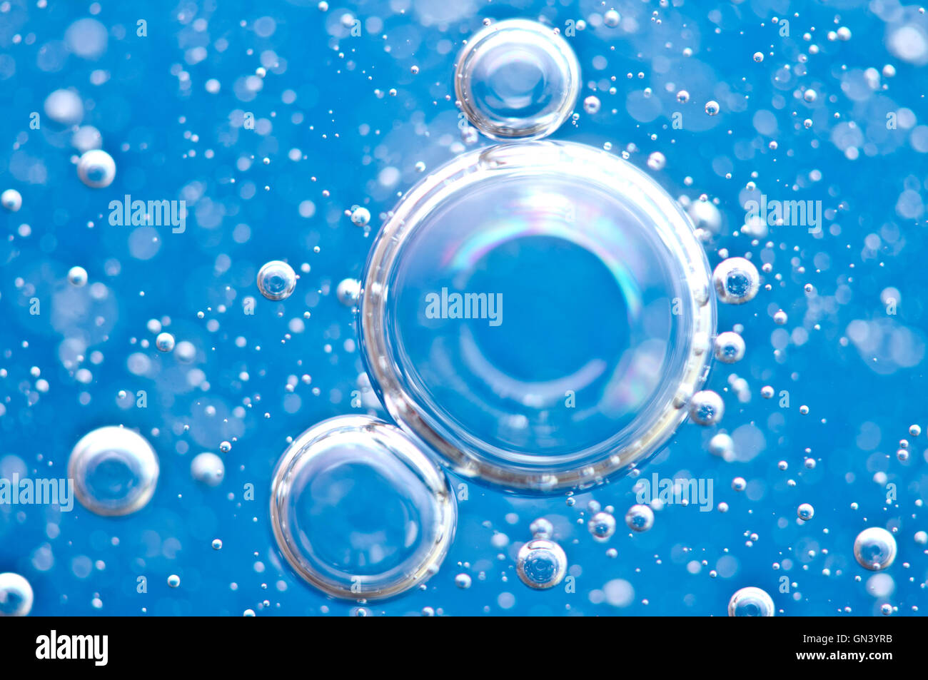 Macro Oxygen bubbles in blue clear water, concept such as ecology ...