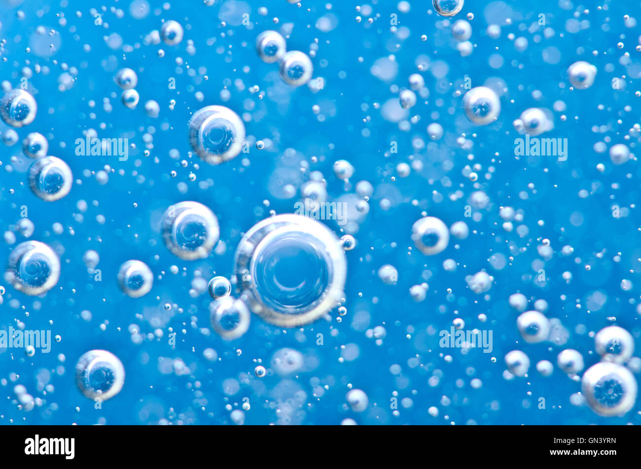Macro Oxygen bubbles in blue clear water, concept such as ecology ...