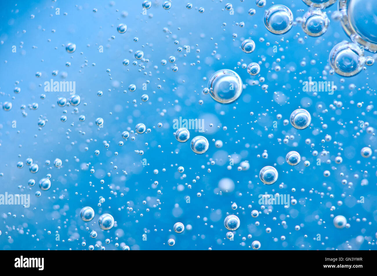 Macro Oxygen bubbles in blue clear water, concept such as ecology ...