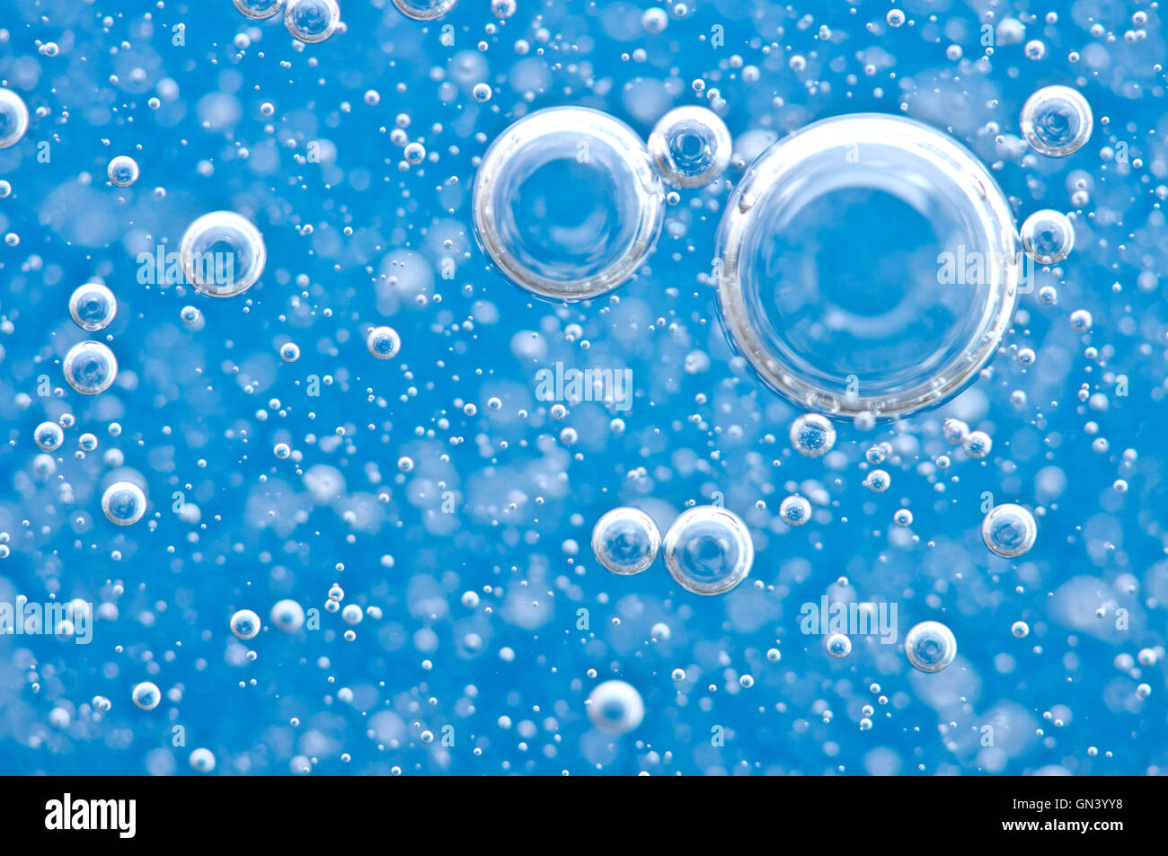 Macro Oxygen bubbles in blue clear water, concept such as ecology ...