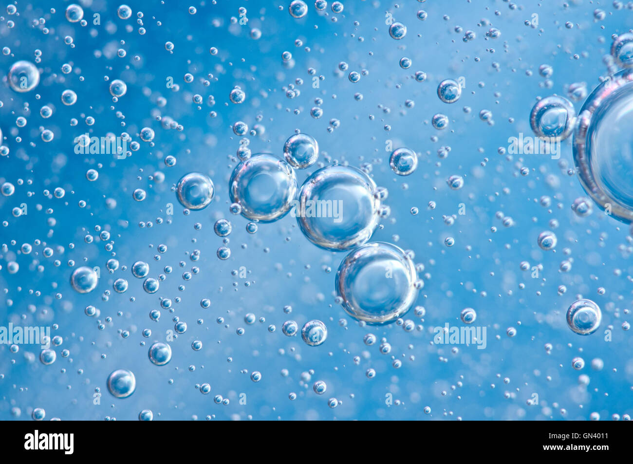Macro Oxygen bubbles in blue clear water, concept such as ecology ...