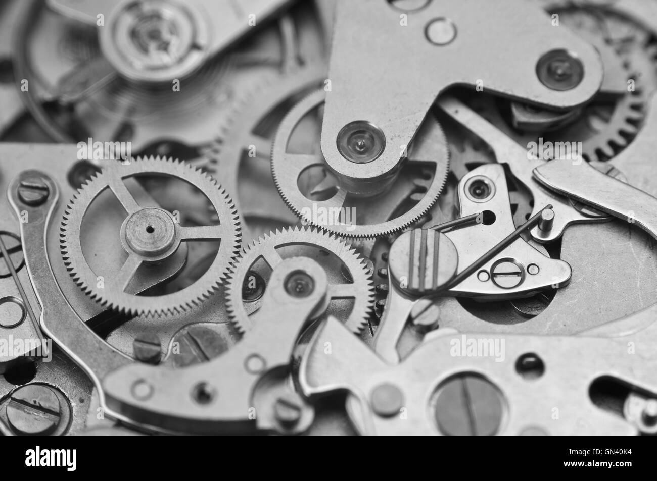 Black and white macro photo close-up view of metal clockwork. Concept ...