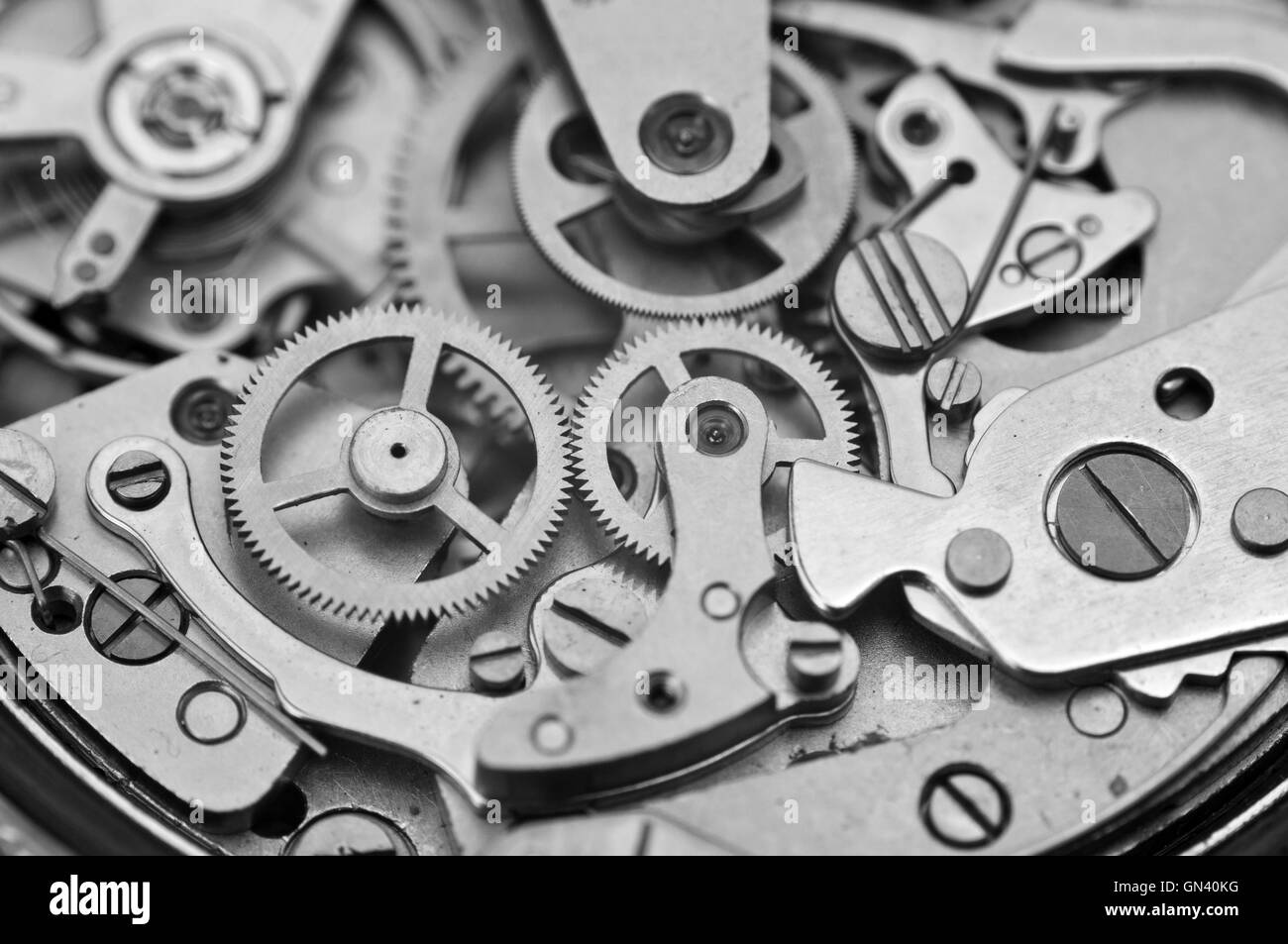 Black and white macro photo close-up view of metal clockwork. Concept ...
