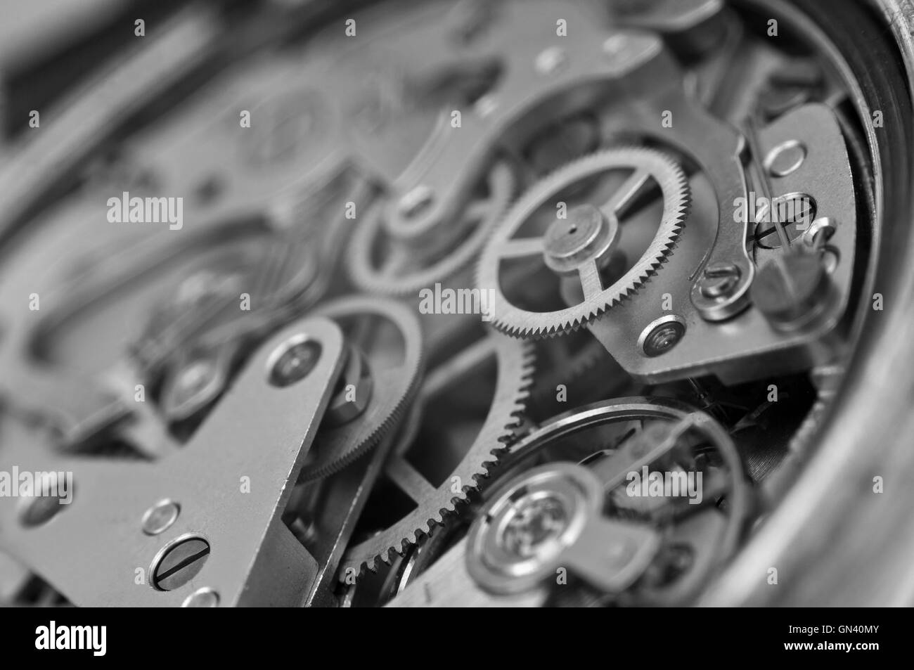 Black and white macro photo close-up view of metal clockwork. Concept ...
