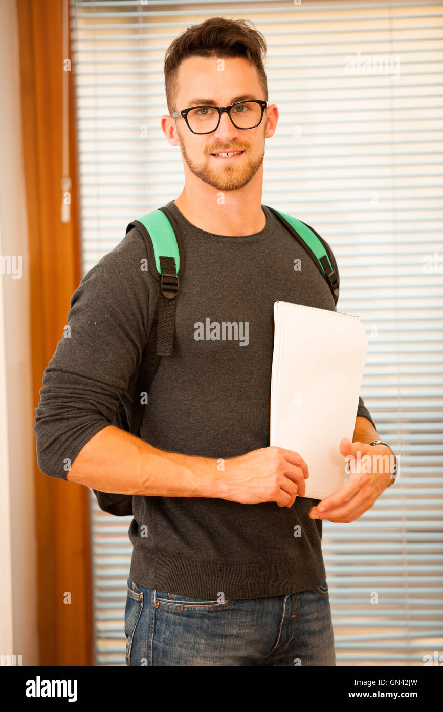 Adult man representing lifelong learning. Man with school bag showing ...