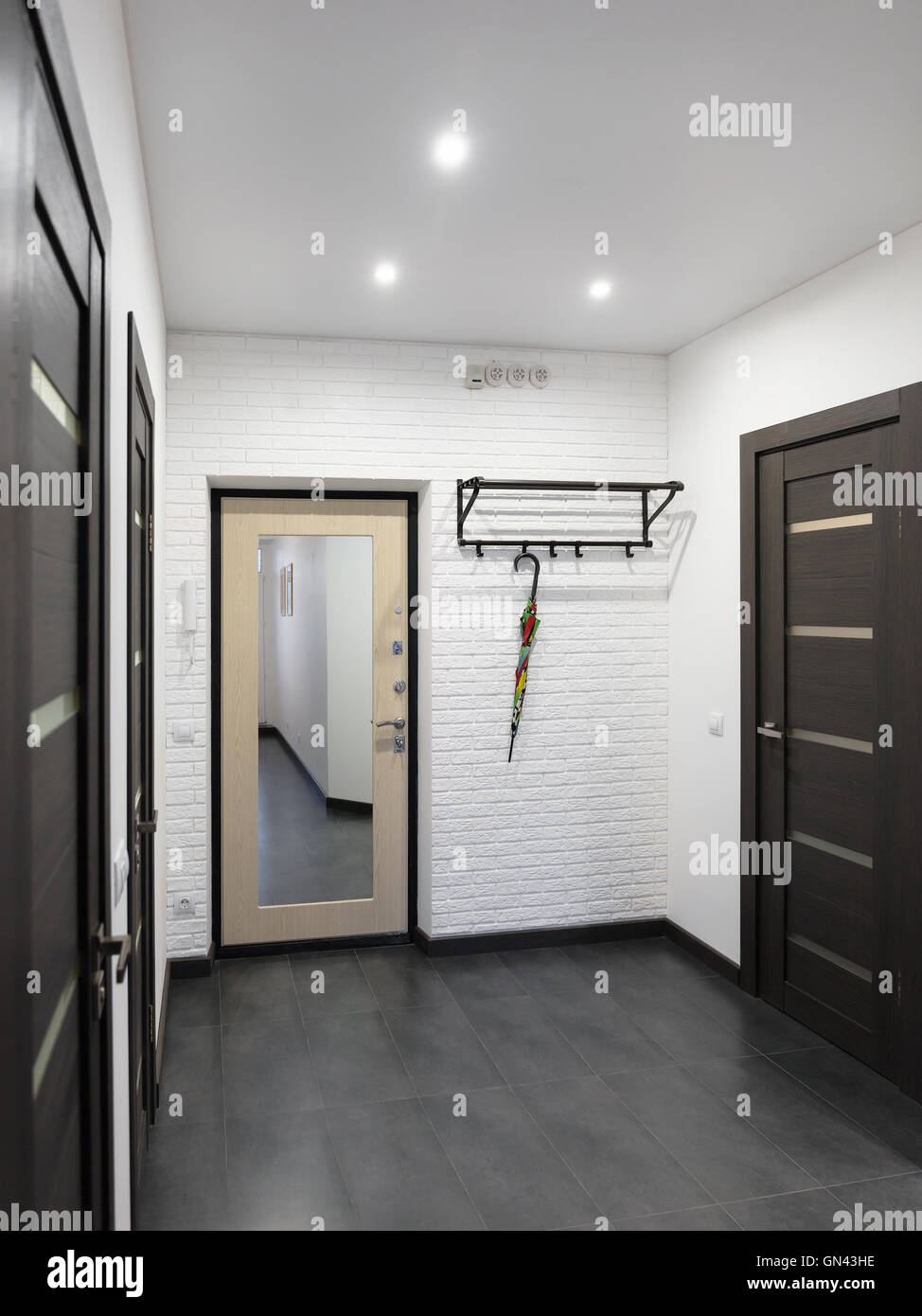 Minimalistic style hall in contemporary apartment Stock Photo - Alamy