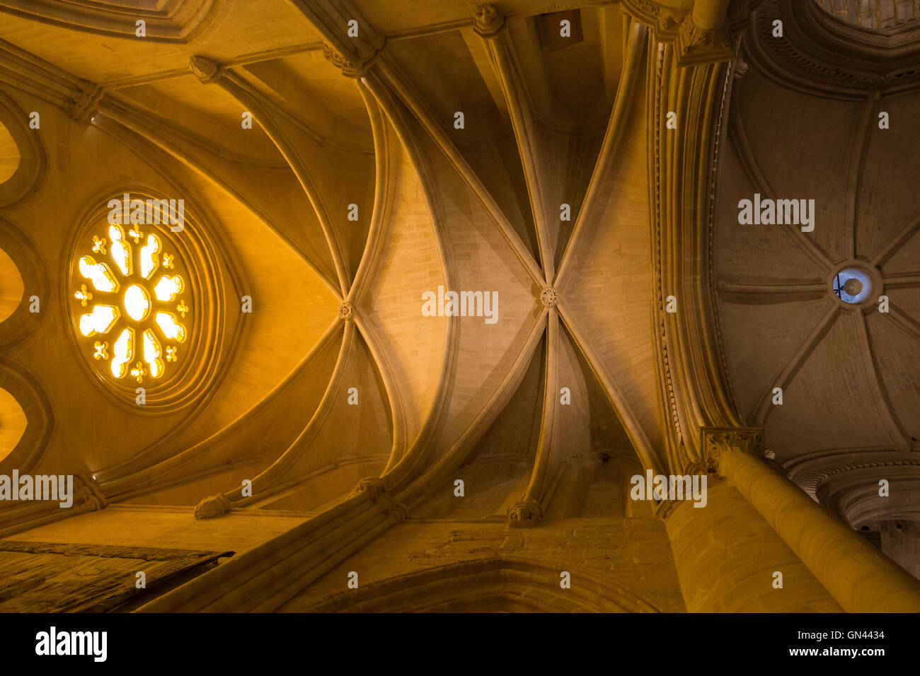 Detail of stained glass window and Vaults of the Transept in the ...