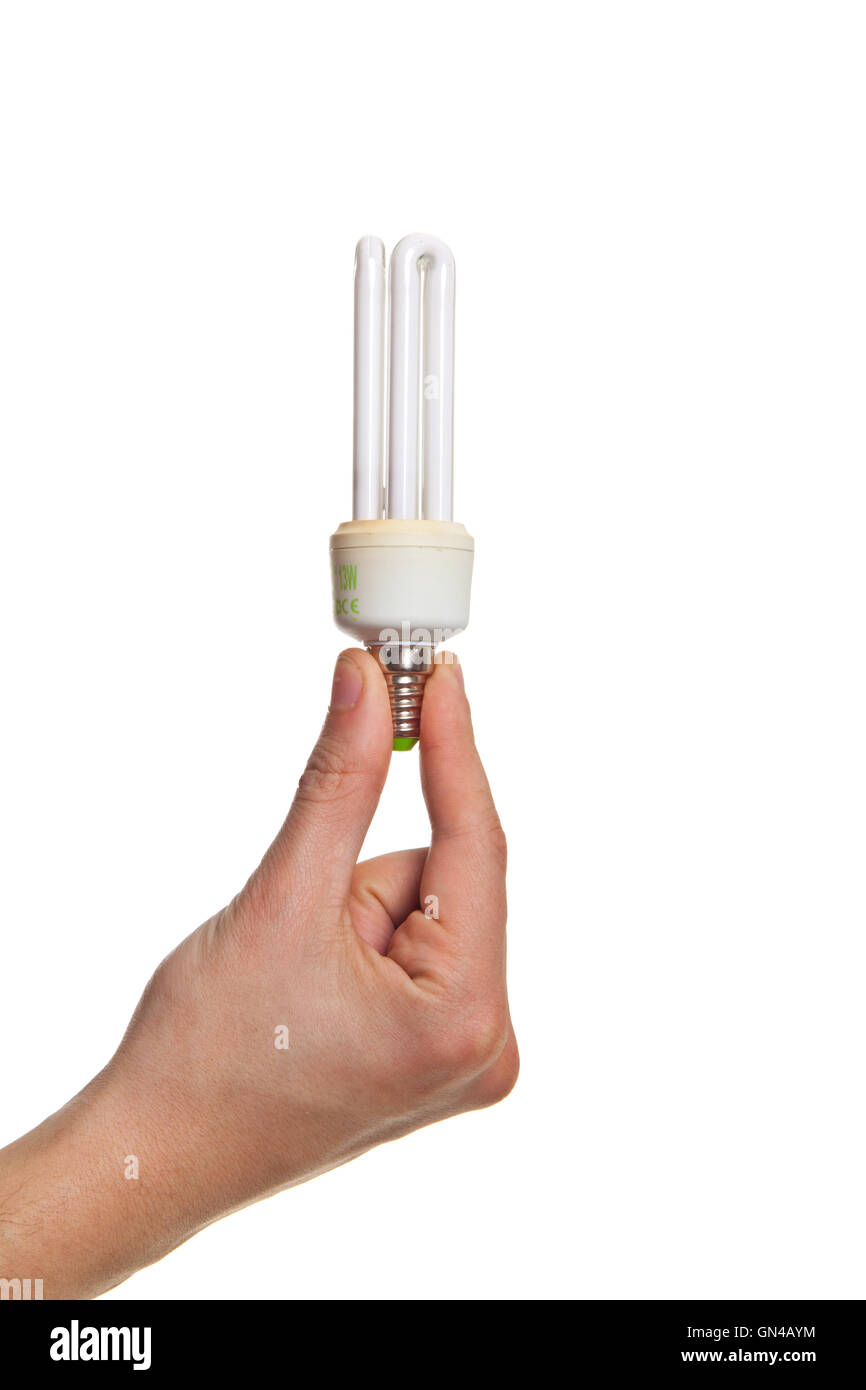 hand holds the lamp electrical economical Stock Photo - Alamy