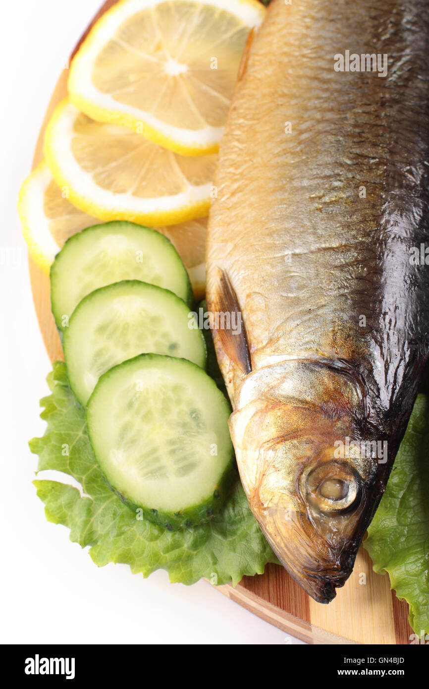 fish with lemon and vegetables Stock Photo - Alamy