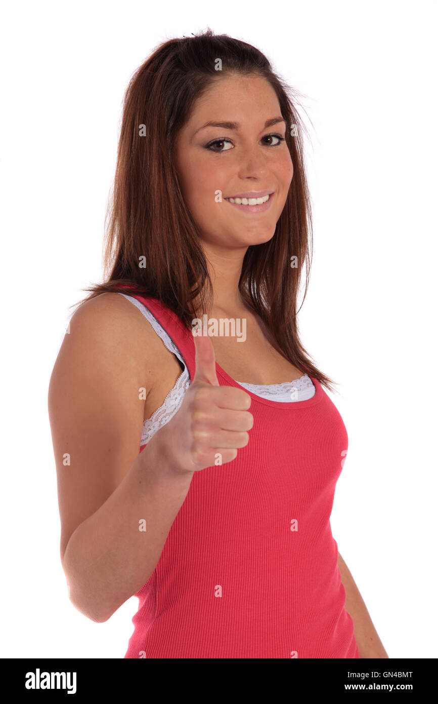 Young woman making positive gesture Stock Photo - Alamy