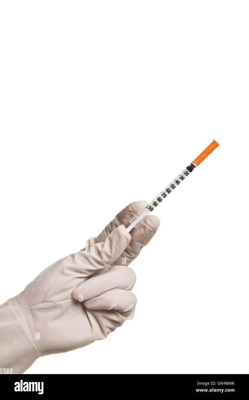 Hand holding syringe isolated on white Stock Photo - Alamy