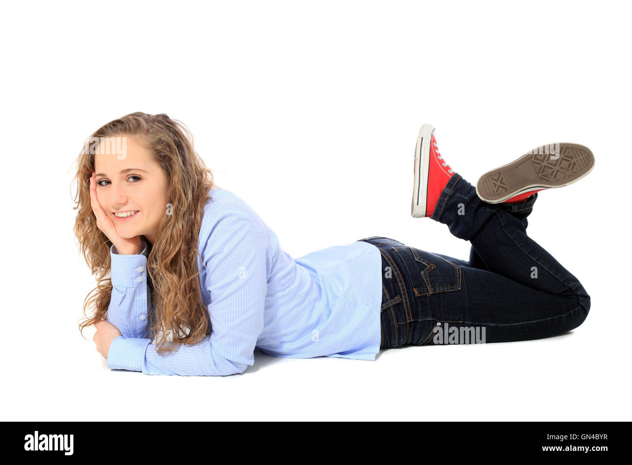 Woman lying on the floor Stock Photo - Alamy