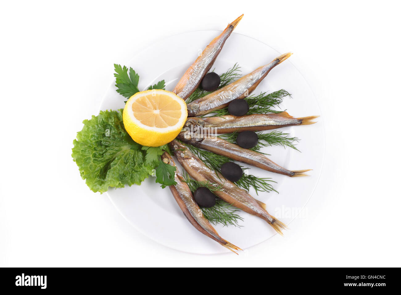 kipper fish on composition with vegetables Stock Photo - Alamy
