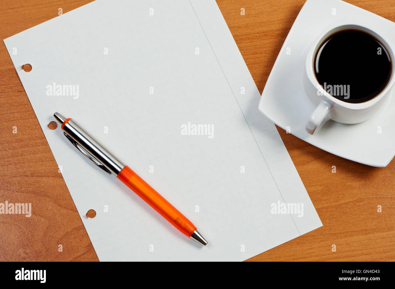 Torn sheet, pen and coffee on table, view from above Stock Photo - Alamy
