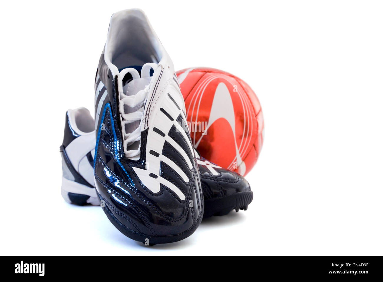 Soccer boot and ball Cut Out Stock Images & Pictures - Alamy