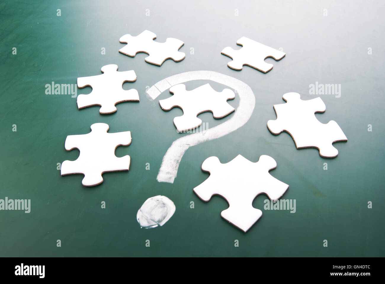 Question mark and puzzle pieces Stock Photo - Alamy